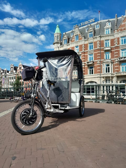 Amsterdam: Private Guided City Tour by Pedicab | GetYourGuide