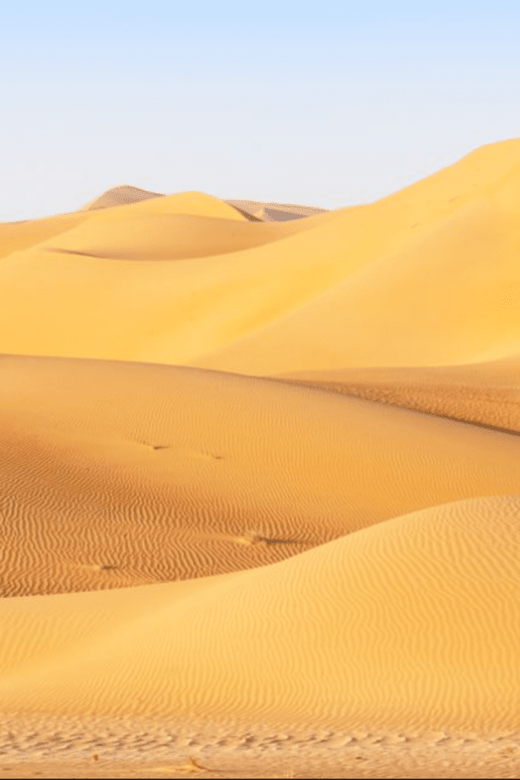 From Muscat: North Dunes and Wadi Hot Spring Tour with Lunch | GetYourGuide