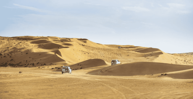 From Muscat: North Dunes and Wadi Hot Spring Tour with Lunch | GetYourGuide