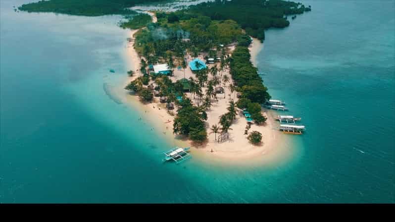Puerto Princesa: Cowrie Island Guided Day Tour with Meal | GetYourGuide