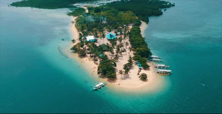 Puerto Princesa: Cowrie Island Guided Day Tour with Meal | GetYourGuide