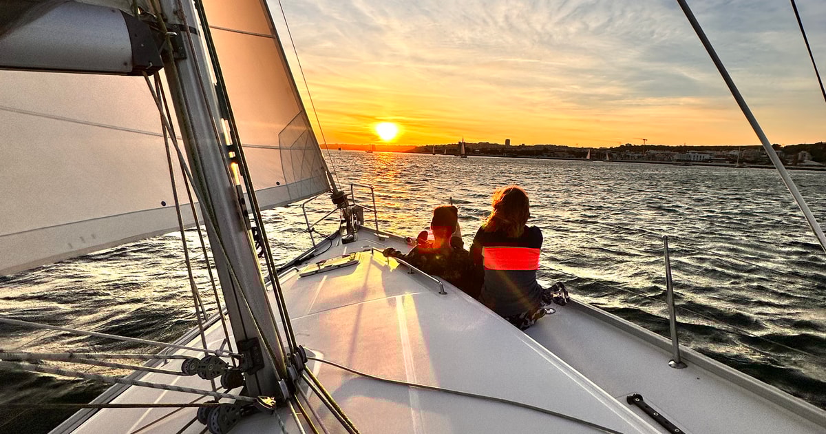 Romantic Sunset Sailing with Wine and Portuguese Tapas | GetYourGuide