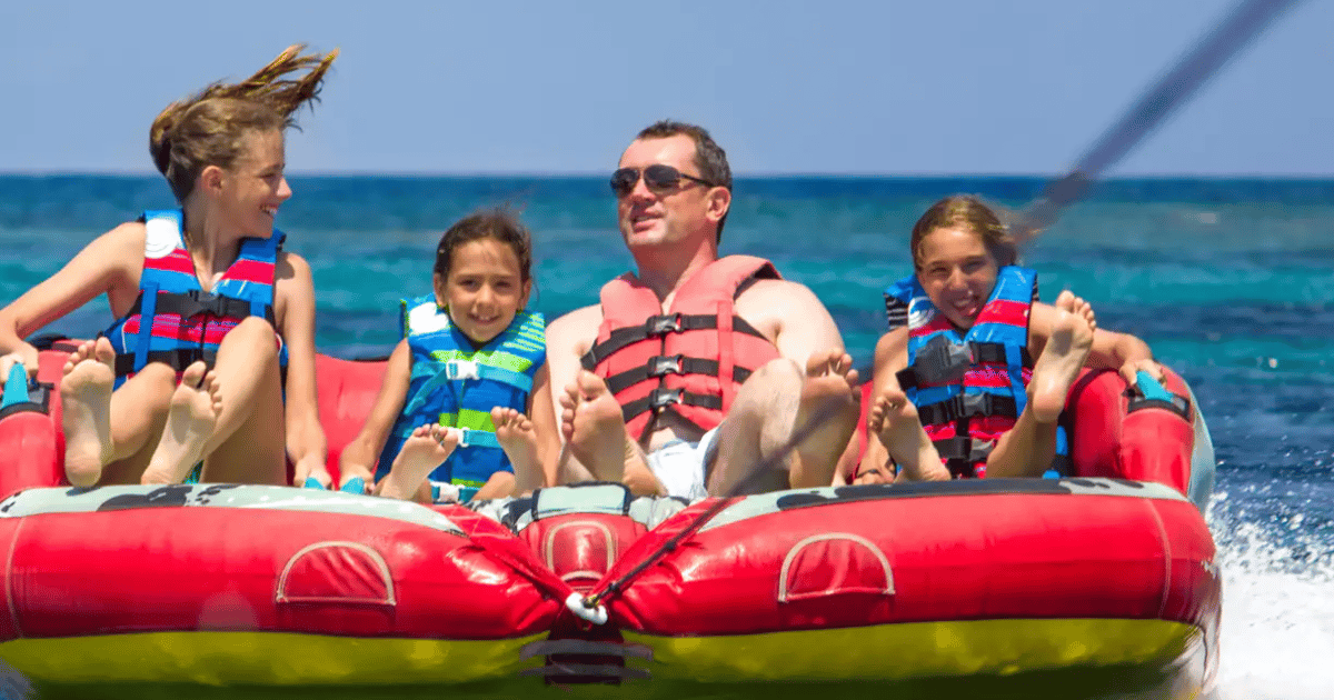 Barcelona: Inflatable Water Tube Ride at Port Olímpic | GetYourGuide