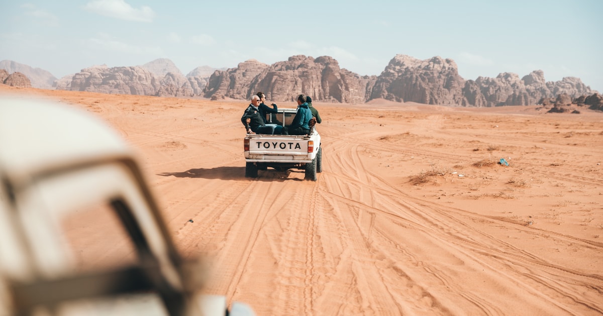 From Aqaba: Wadi Rum Full-Day Private Jeep Tour with Dinner | GetYourGuide