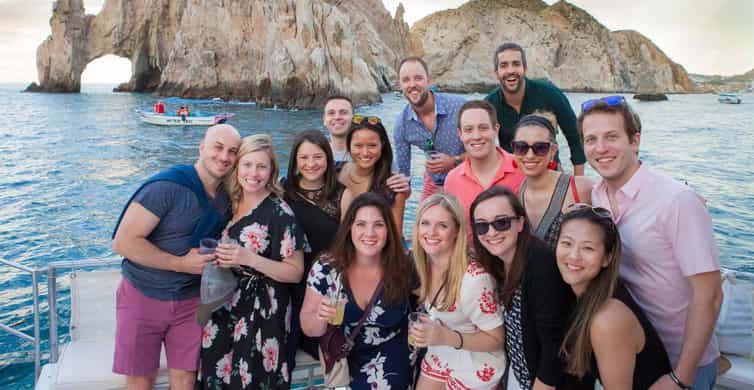Cabo San Lucas: Catamaran Party Tour with Snacks & Open Bar | GetYourGuide