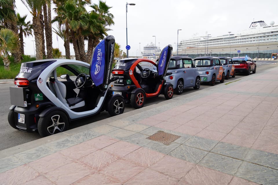 Malaga: Electric Car City Tour and visit Gibralfaro Castle | GetYourGuide