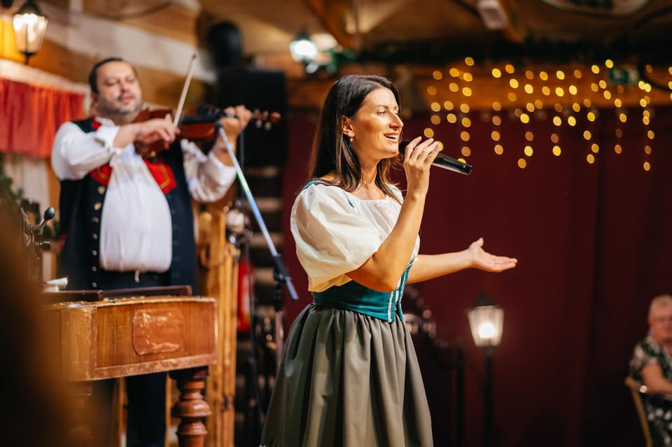 Dinner with Folk Show and Open Bar | GetYourGuide