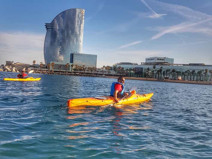 Barcelona Skyline Kayaking & Tapas Bite | GetYourGuide