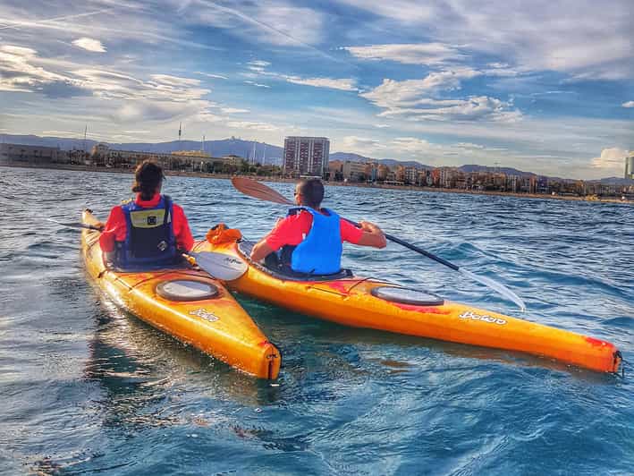 Barcelona Skyline Kayaking & Tapas Bite | GetYourGuide
