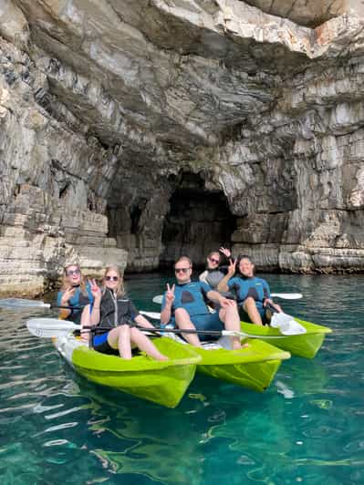 Pula: Half-Day Kayak, Cliff, and Cave Tour | GetYourGuide