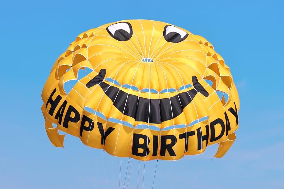 Dubai: Parasailing with Happy birthday Parachute JBR & Palm | GetYourGuide