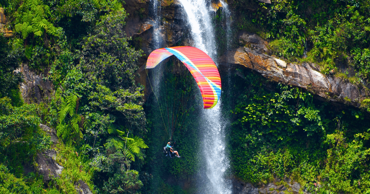 From Medellin: Private Paragliding Tour Over Waterfalls | GetYourGuide
