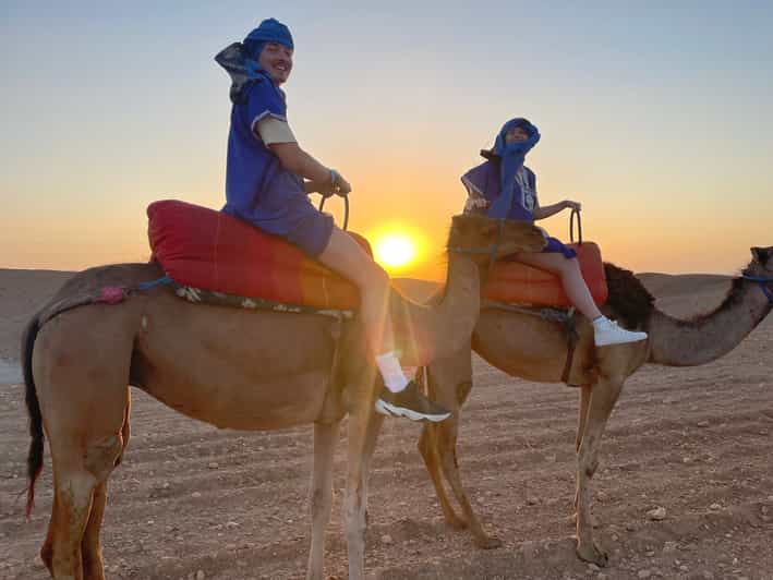 Agafay Desert Sunset Camel Ride | GetYourGuide
