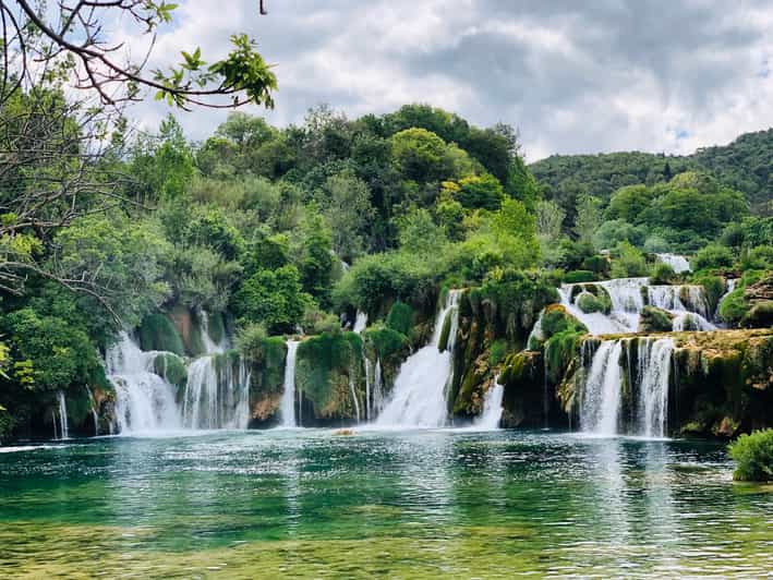 From Zadar: Krka Waterfalls Day Tour with Boat Ride | GetYourGuide
