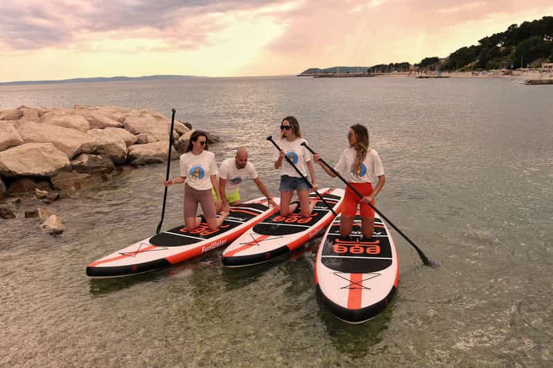 Split: Glow-in-the-dark Sunset Stand-Up Paddle Board Tour | GetYourGuide