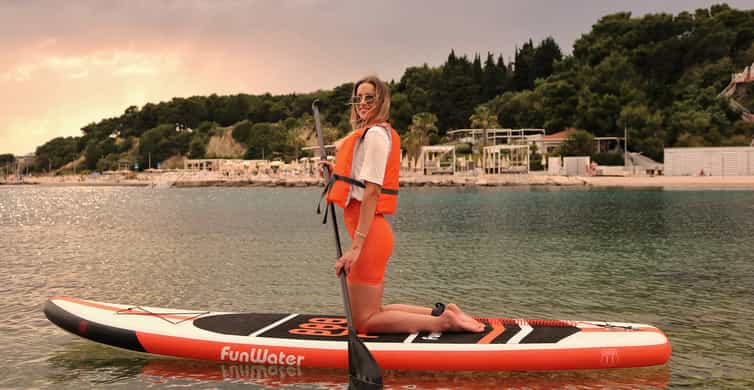 Split: Glow-in-the-dark Sunset Stand-Up Paddle Board Tour | GetYourGuide