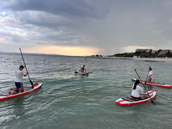 Split: Glow-in-the-dark Sunset Stand-Up Paddle Board Tour | GetYourGuide