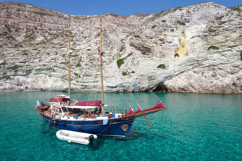 Milos: Cruise via Traditional Boat with Beach and Cave Stops | GetYourGuide