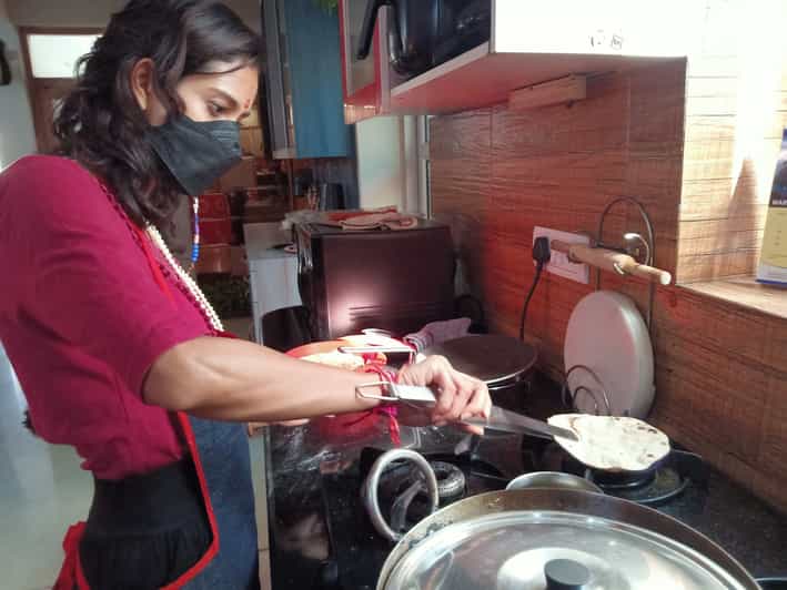 Cook Indian food w/ local Family at their traditional Home | GetYourGuide