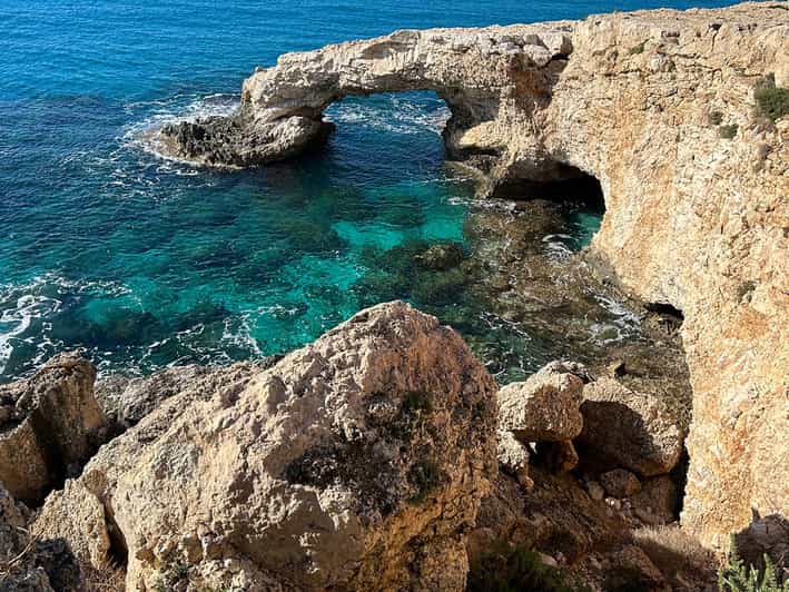 Cape Greco: Sea Caves, Bridge of Lovers with Barbeque | GetYourGuide