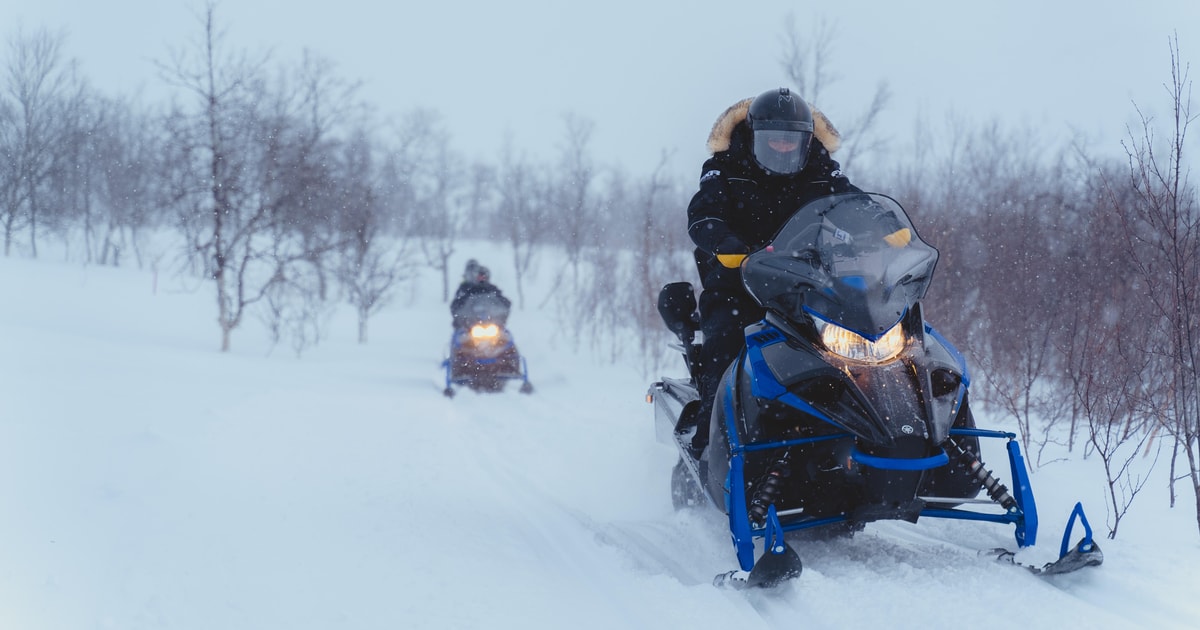 From Tromsø: Midday Snowmobiling at Camp Tamok | GetYourGuide