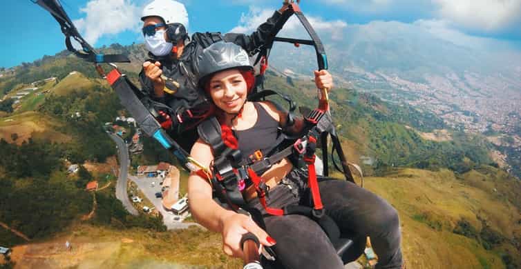 Paraglide over beautiful Medellin | GetYourGuide