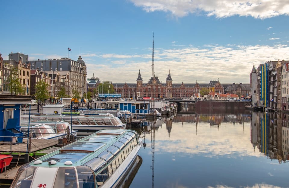 Cattura i luoghi più fotogenici di Amsterdam con un locale | GetYourGuide Cattura i luoghi più fotogenici di Amsterdam con un locale | GetYourGuide