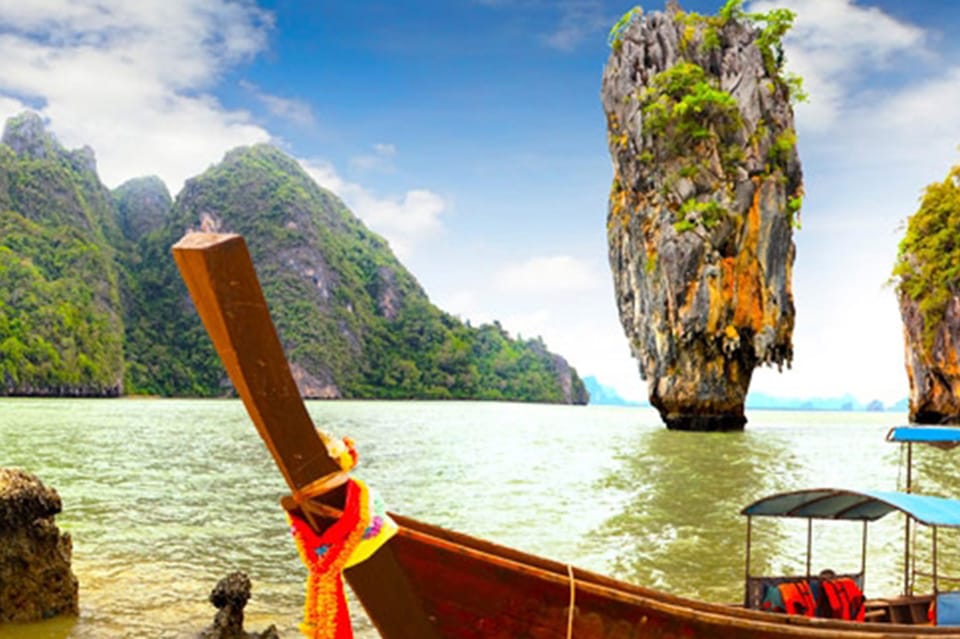 Bahía de Phang Nga privada en barco de cola larga con canoa | GetYourGuide