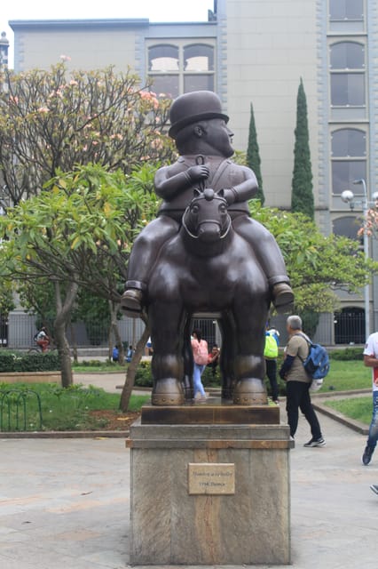 Medellín: botero square, historic center with a street snack | GetYourGuide