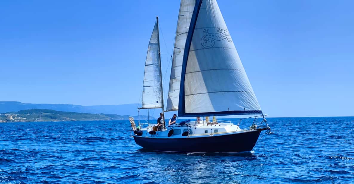 Alghero: Day trip on a sailing boat | GetYourGuide