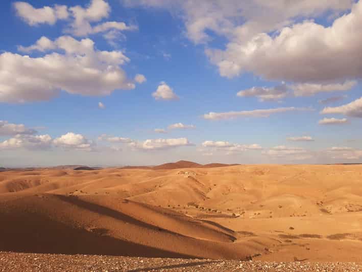 Marrakesh: Agafay-woestijn en Atlasgebergte met kameelrit | GetYourGuide