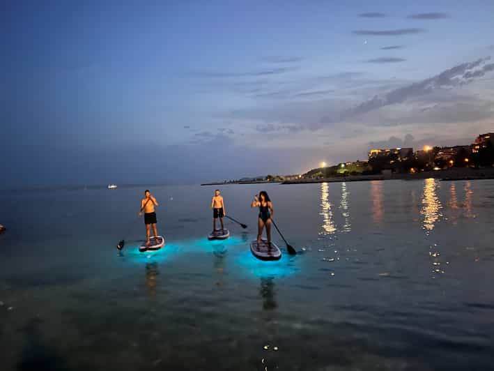Split: Glow-in-the-dark Sunset Stand-Up Paddle Board Tour | GetYourGuide