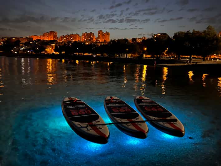 Split: Glow-in-the-dark Sunset Stand-Up Paddle Board Tour | GetYourGuide