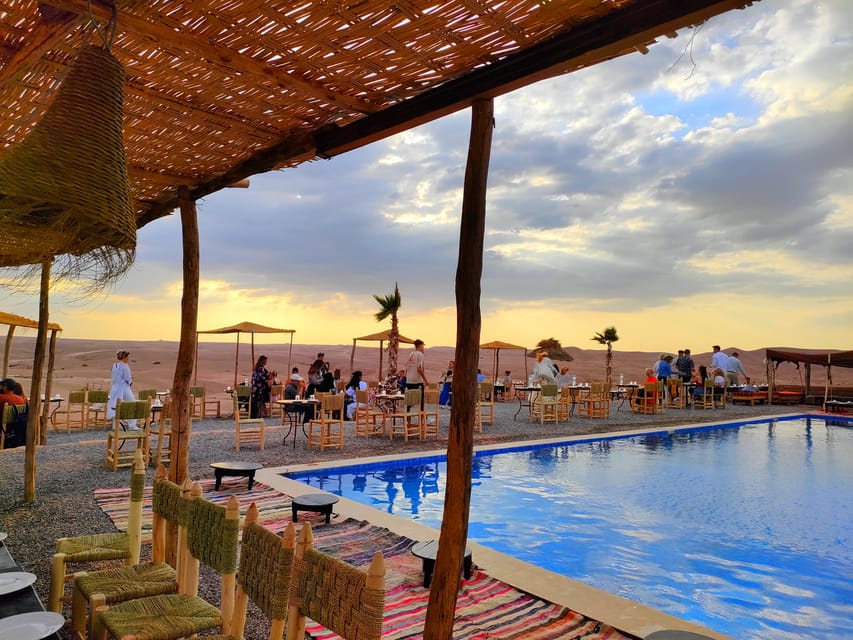 From Marrakech: Agafay Desert Sunset Dinner with Live Show | GetYourGuide