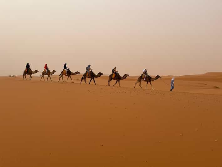 Merzouga: Overnight Camel Trek with Sandboarding | GetYourGuide