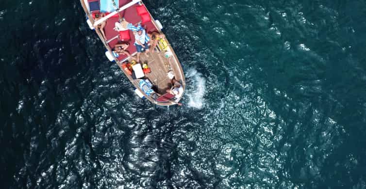 Boat tours to Capri explores the sea and its coast | GetYourGuide