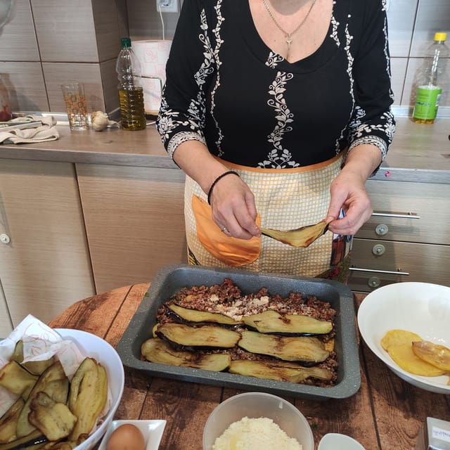 Cook and dine with a Greek family | GetYourGuide