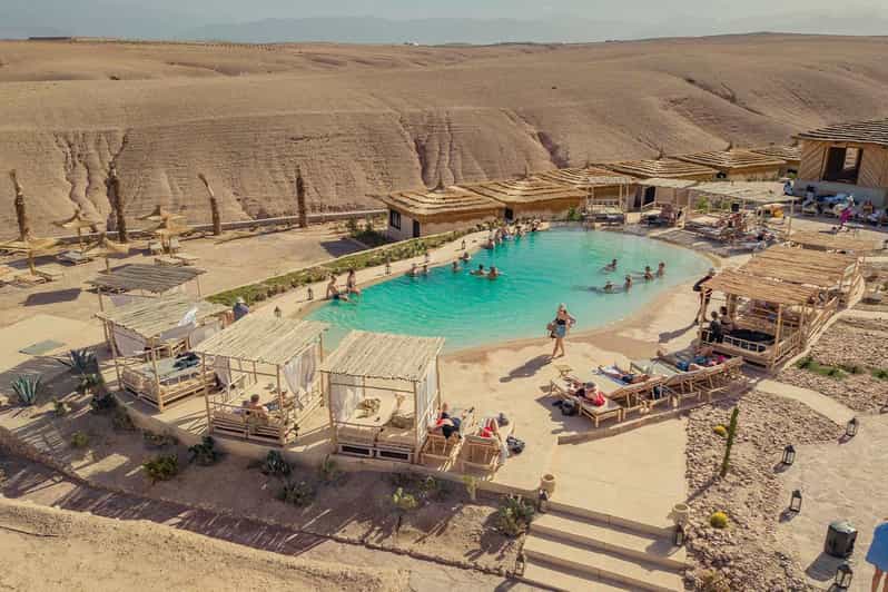 Pool, Quad Bike, Camel Ride and a Dinner Show in Agafay | GetYourGuide