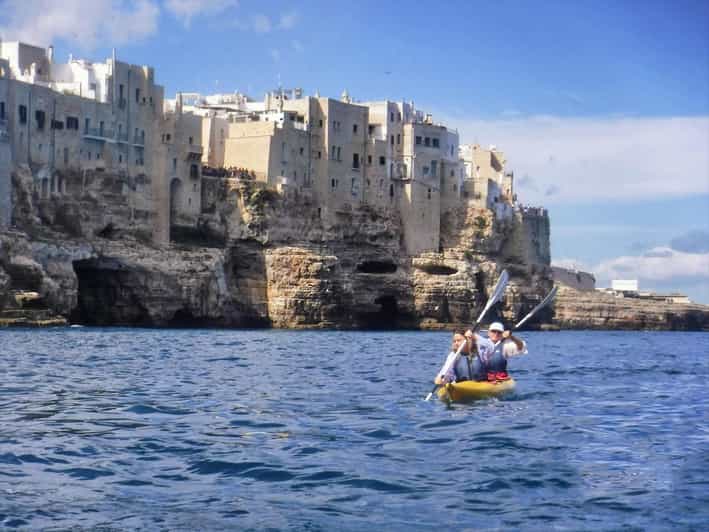 Polignano sea kayak tour with a swimming stop in a cave | GetYourGuide