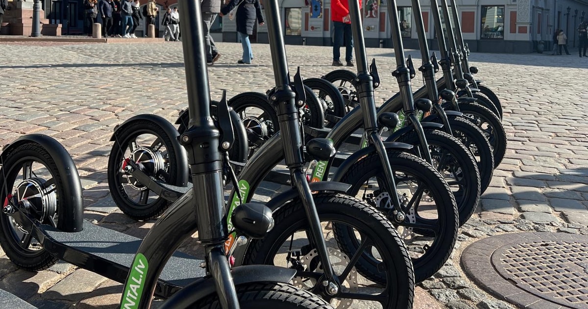 Riga Highlight Big wheel e-scooter Group tour | GetYourGuide