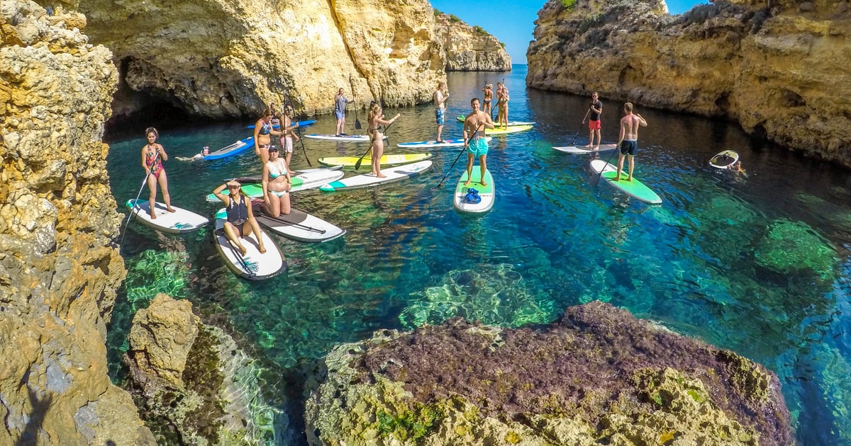 Ibiza: Stand-Up Paddle Boarding Trip to Secret Caves | GetYourGuide