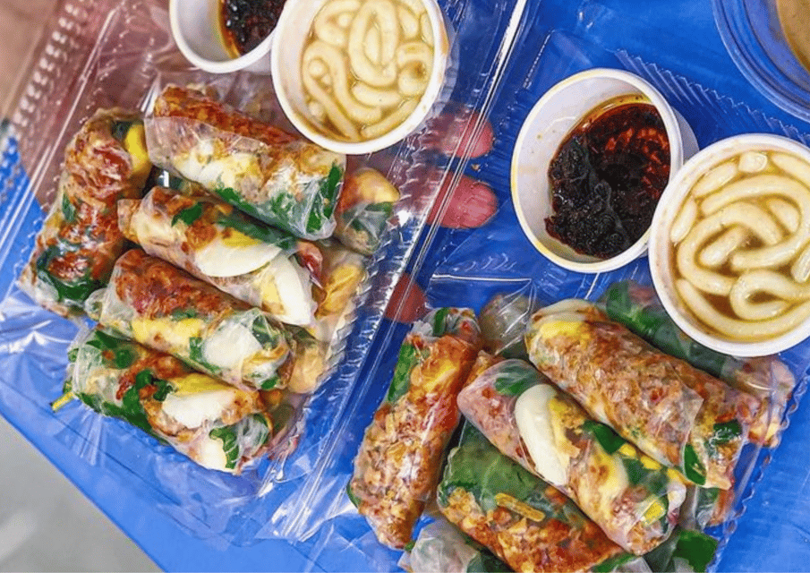 Curious about Vietnam: Food and Train street | GetYourGuide