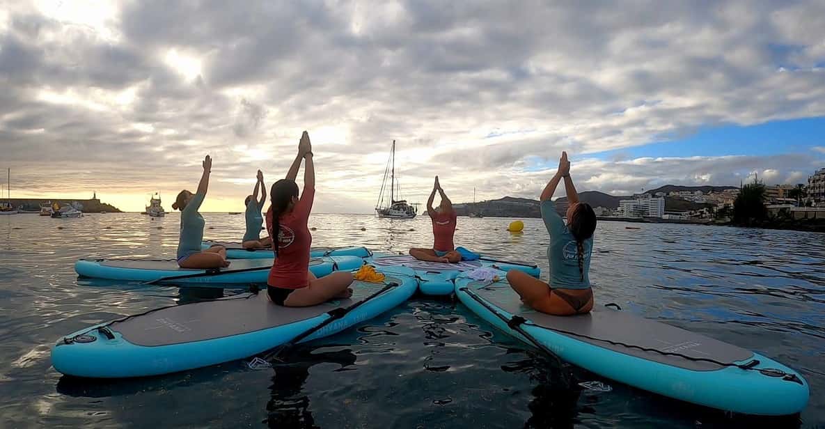 Arguineguín: Stand-up Paddleboard Yoga Class with Instructor | GetYourGuide
