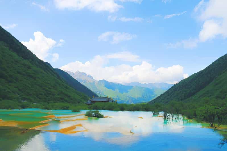 Huanglong Scenic Area: Explore Stunning Five-Colored Ponds | GetYourGuide