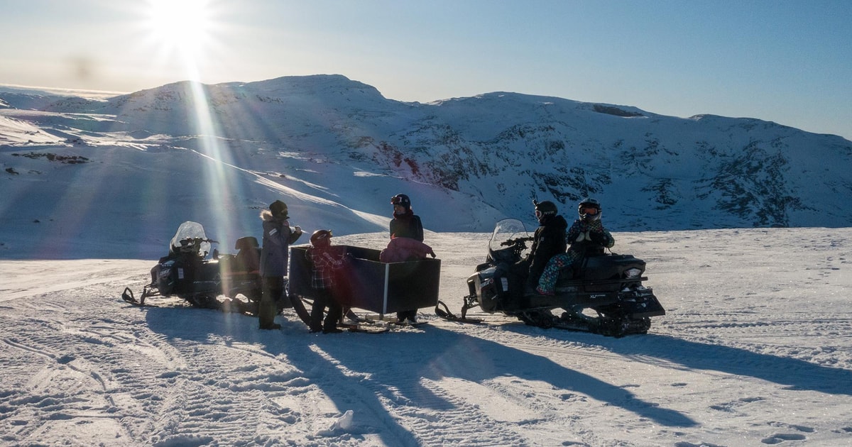 Abisko: Snowmobile Sled Expedition with Snack and Hot Drink | GetYourGuide