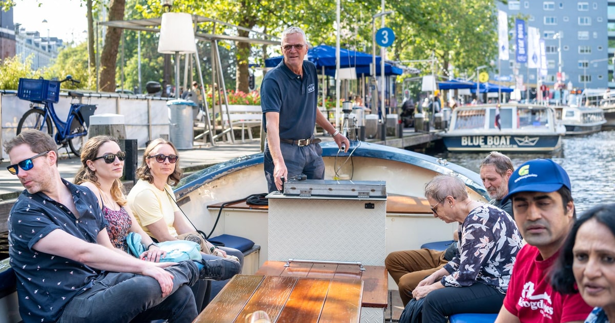 Amsterdam: 75 minuten Open Boot Rondvaart met Live Gids | GetYourGuide