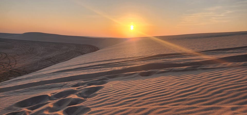 Doha: Desert Safari with Sandboarding and Inland Sea | GetYourGuide