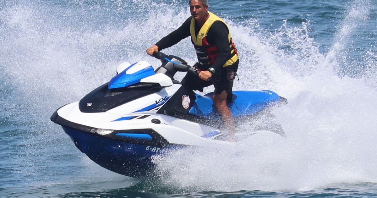 Valencia: Excursión en moto de agua + paddle surf | GetYourGuide