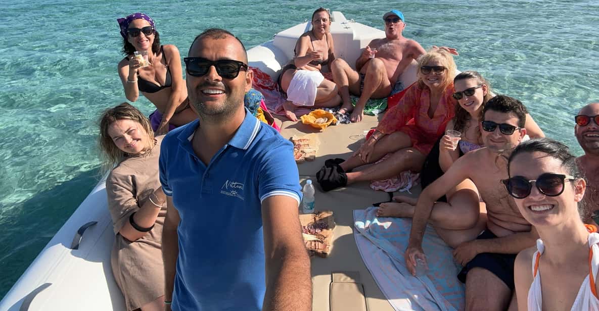 Teulada: Afternoon tour in dinghy with aperitif in Zafferano | GetYourGuide