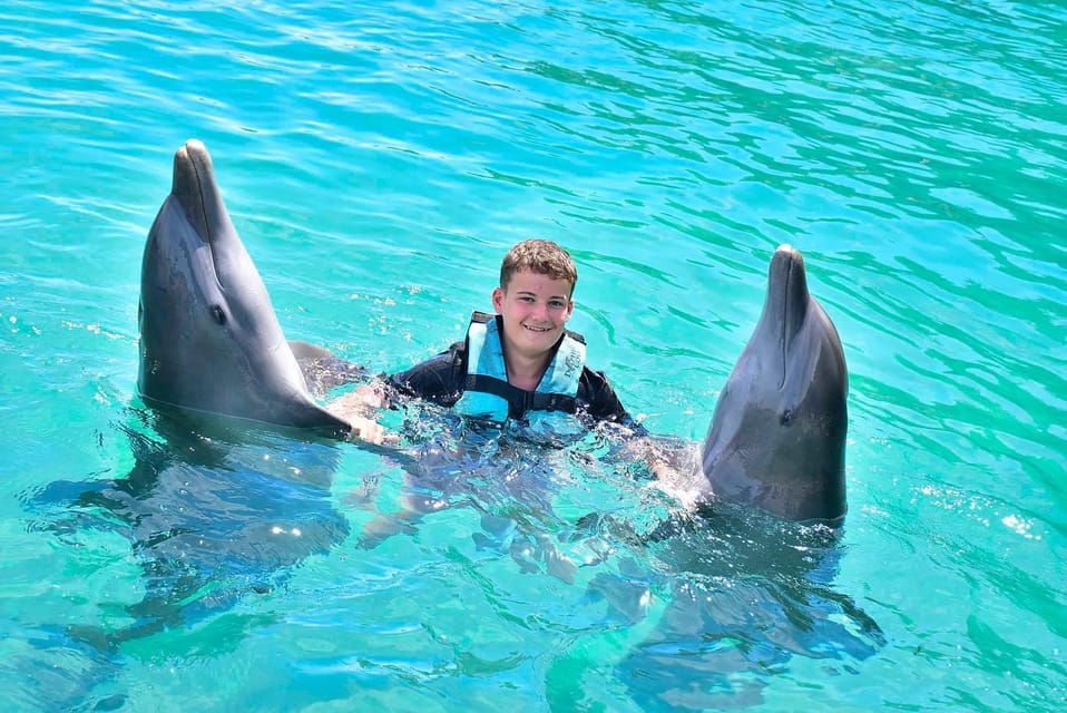 Dunn’s River Falls and Dolphin Cove Swim Adventure | GetYourGuide